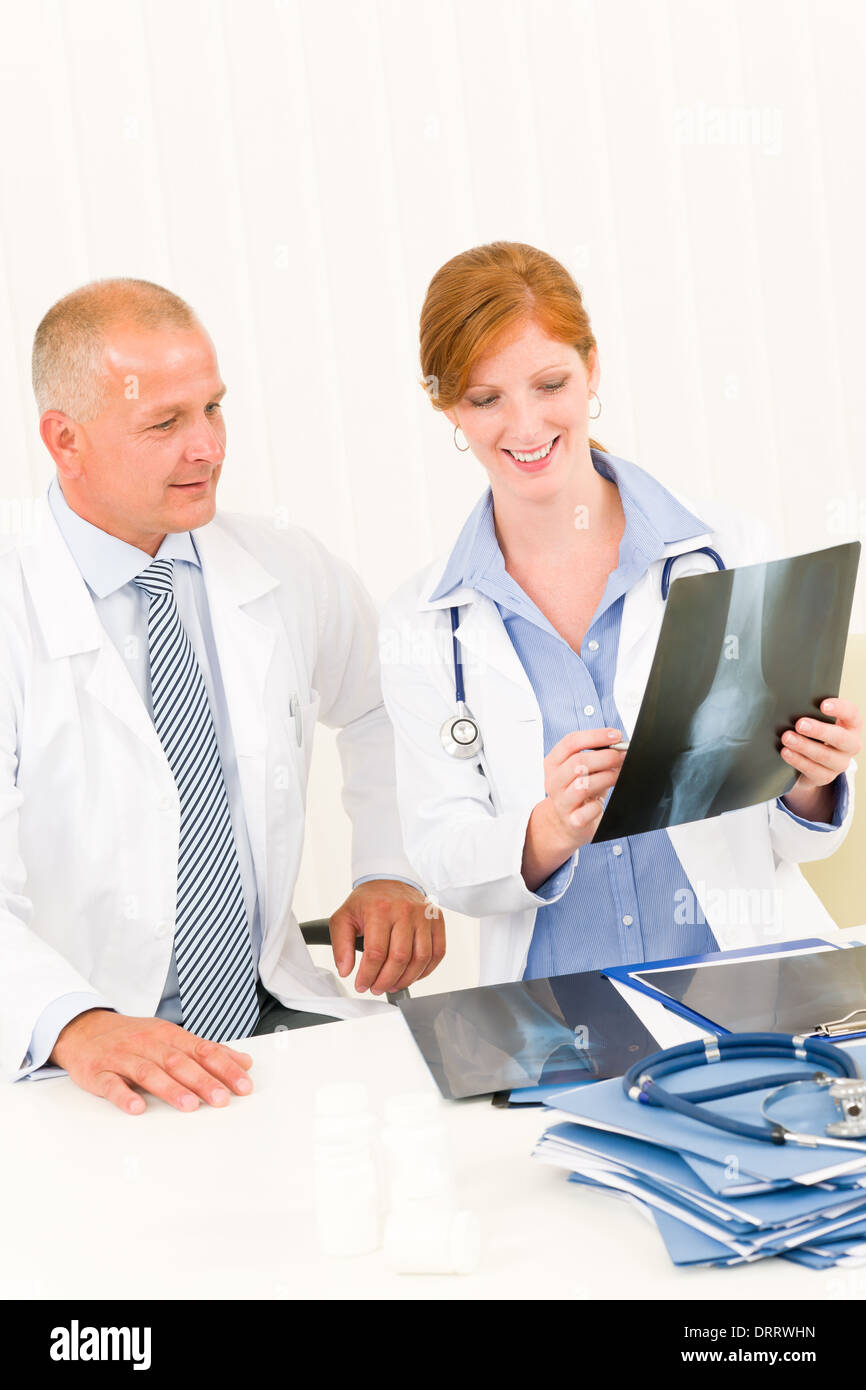 Medical doctor team look point at x-ray Stock Photo - Alamy