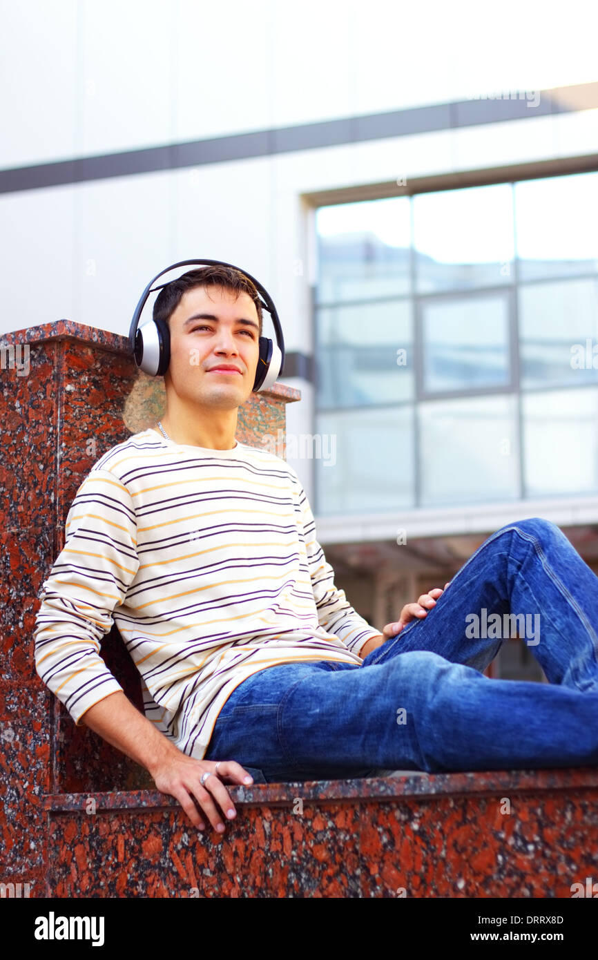 The man next to the building Stock Photo - Alamy