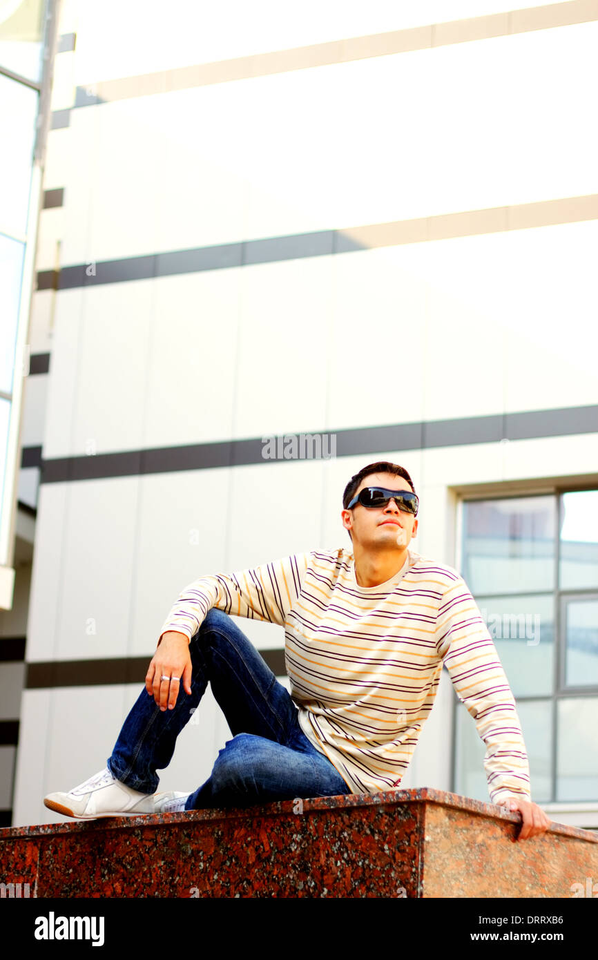 The man next to the building Stock Photo - Alamy