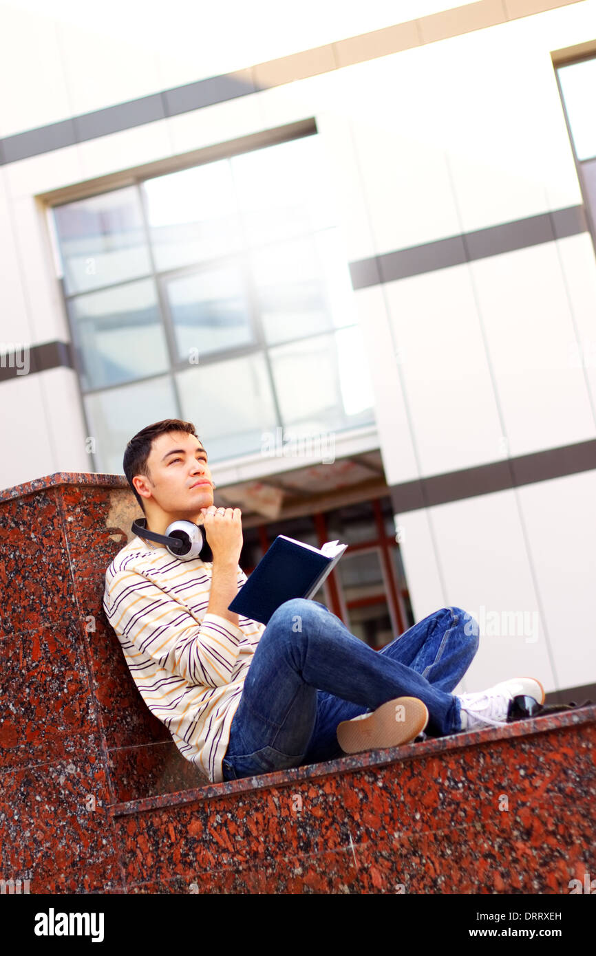 The man next to the building Stock Photo - Alamy