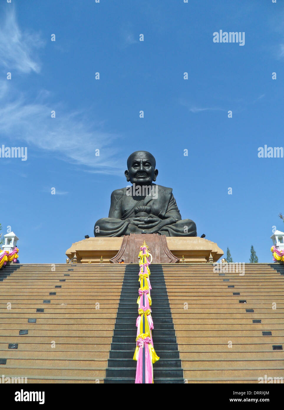 Thai style statue monk on south of Thailand Stock Photo - Alamy