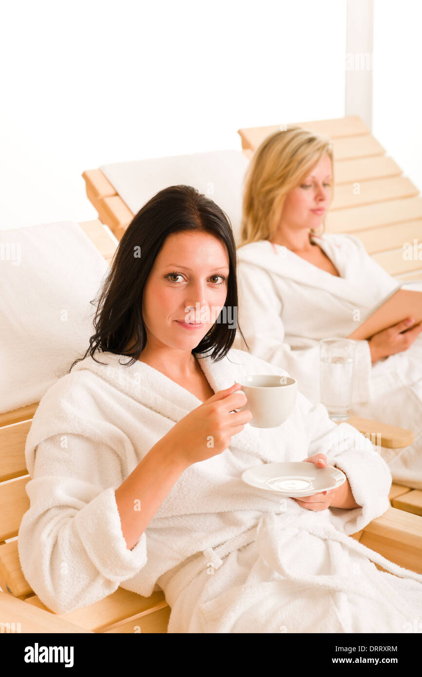 Beauty spa relax two women on sun-beds Stock Photo - Alamy