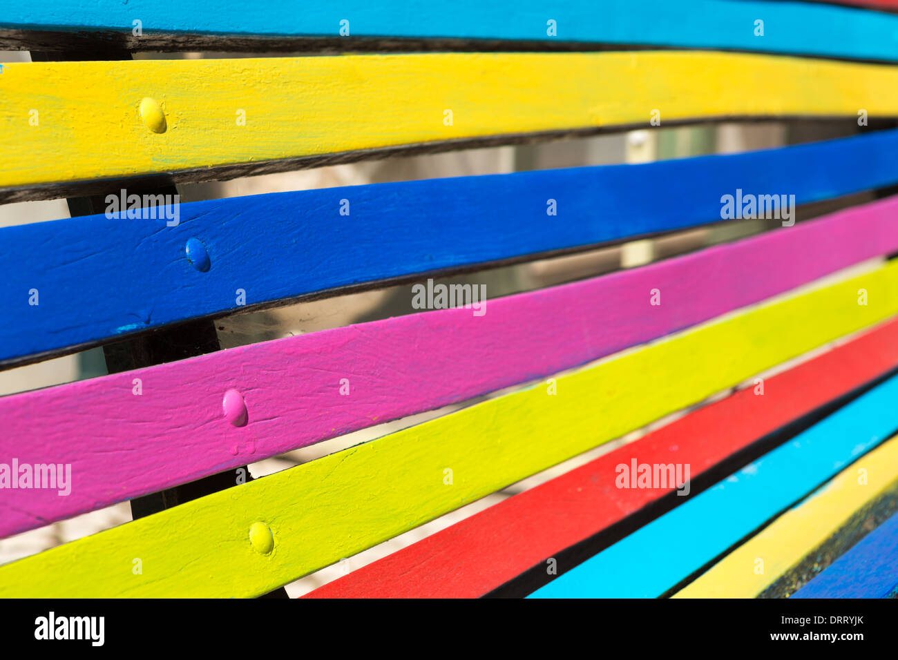 Detail of a beautiful colored bench in a sunny day Stock Photo - Alamy