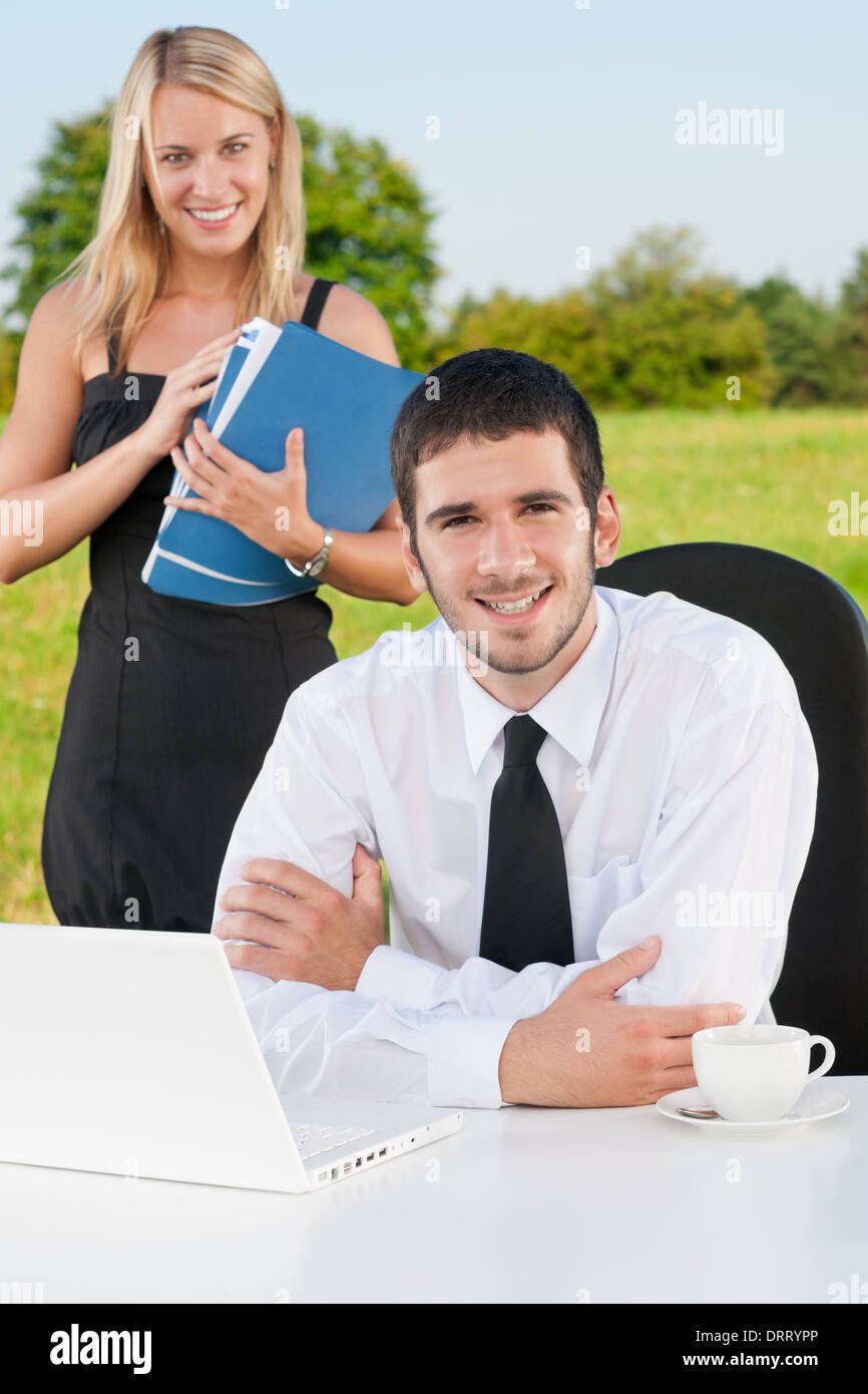 Business colleagues in nature office smile Stock Photo - Alamy