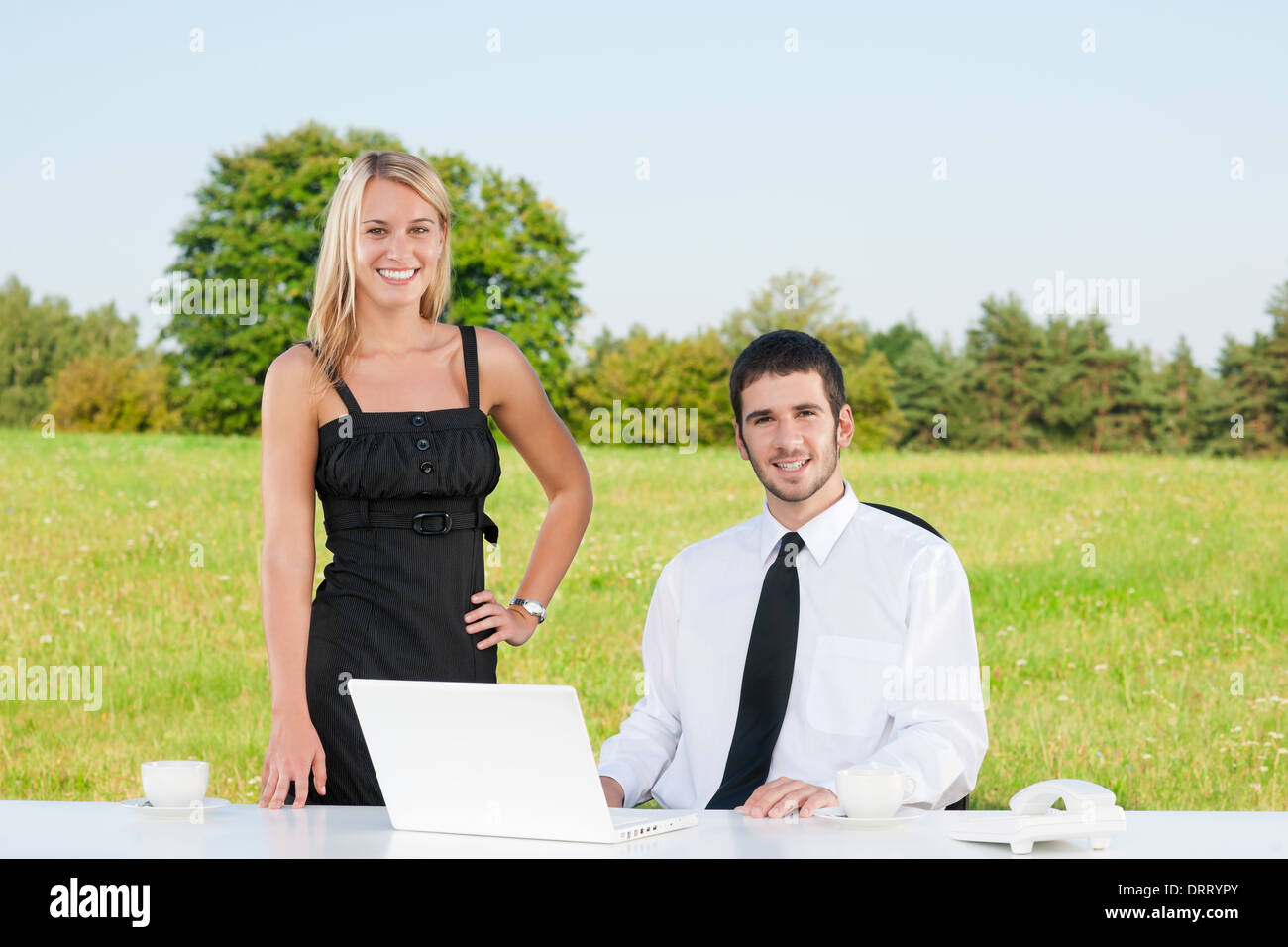 Business colleagues in nature office smile Stock Photo - Alamy