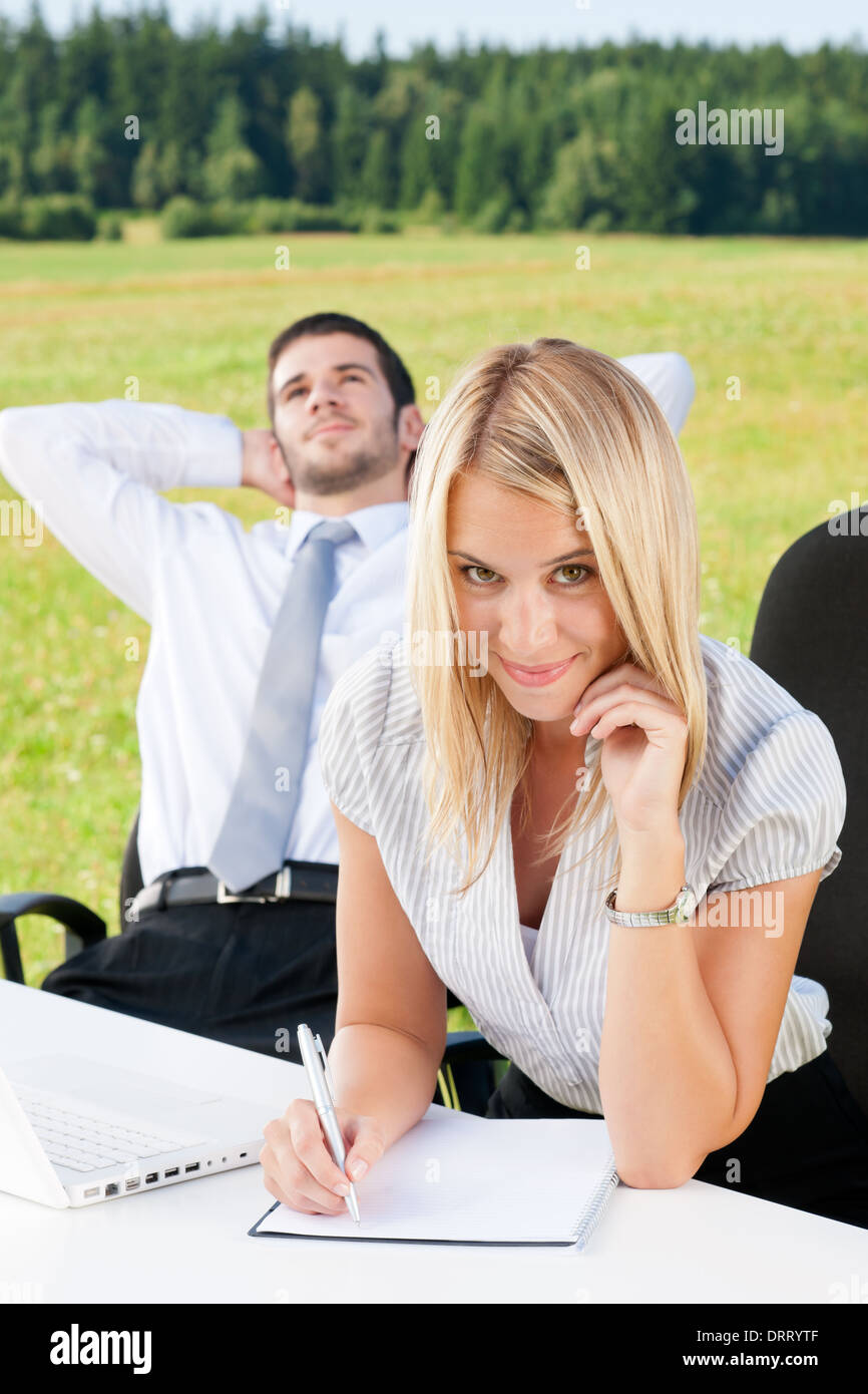 Business colleagues in nature office smile Stock Photo - Alamy