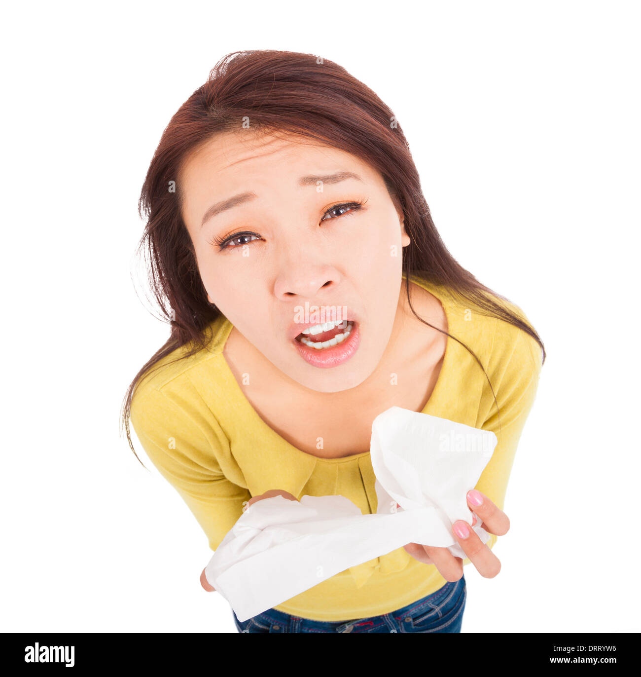 young woman is sneezing with painful face Stock Photo - Alamy