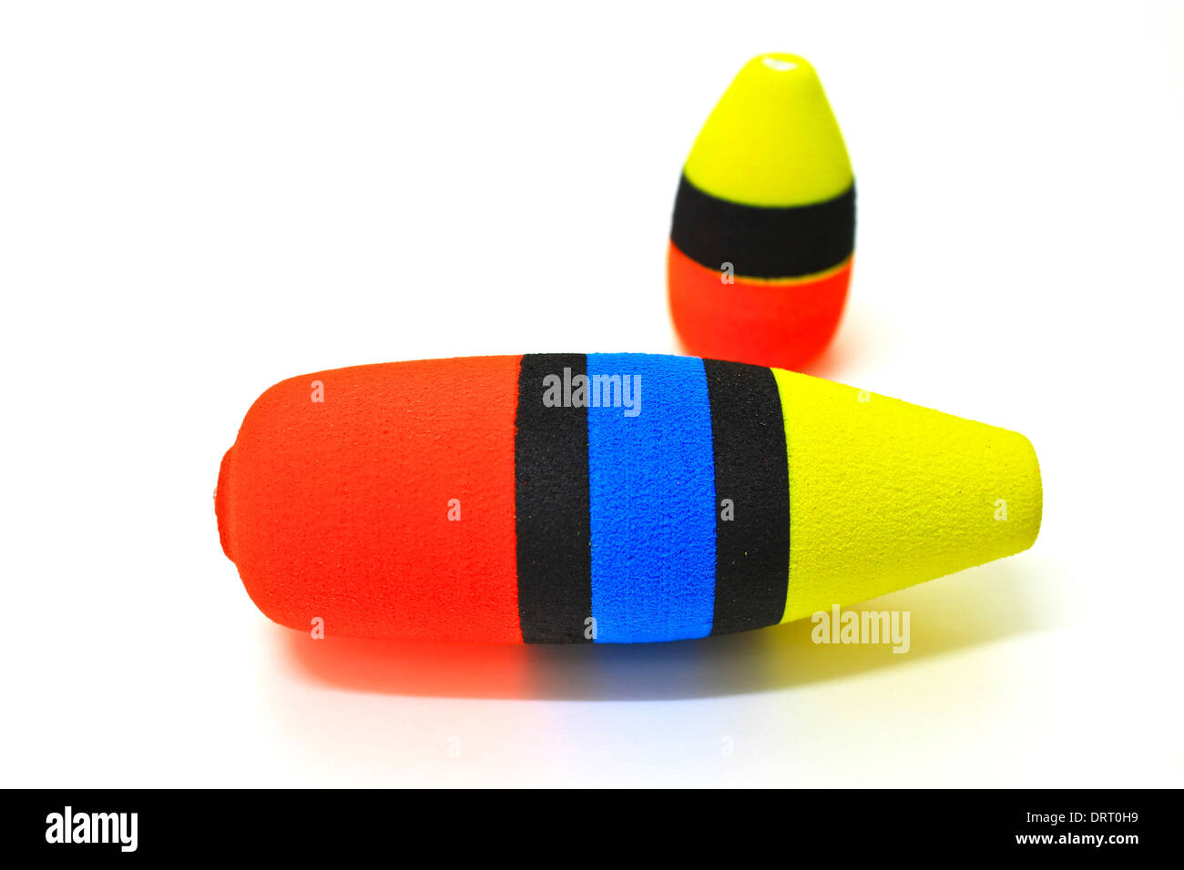Fishing floats on a white background Stock Photo - Alamy