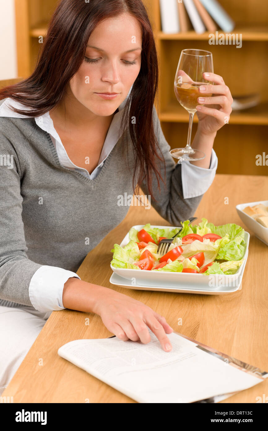 Healthy lunch at home woman read magazine Stock Photo - Alamy