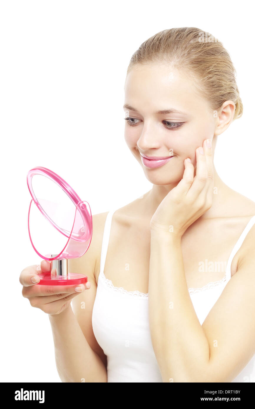 White teen girl looking up with hand on cheek hi-res stock photography ...