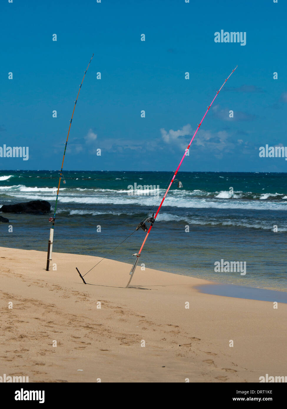 Fishing at the beach Stock Photo - Alamy