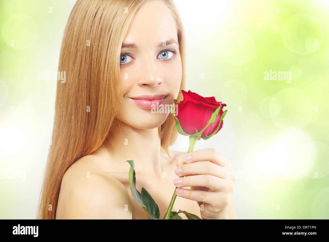 Beautiful girl with red rose Stock Photo - Alamy