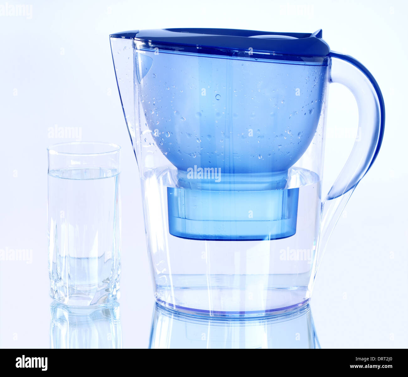 Water filter on a light blue background Stock Photo - Alamy
