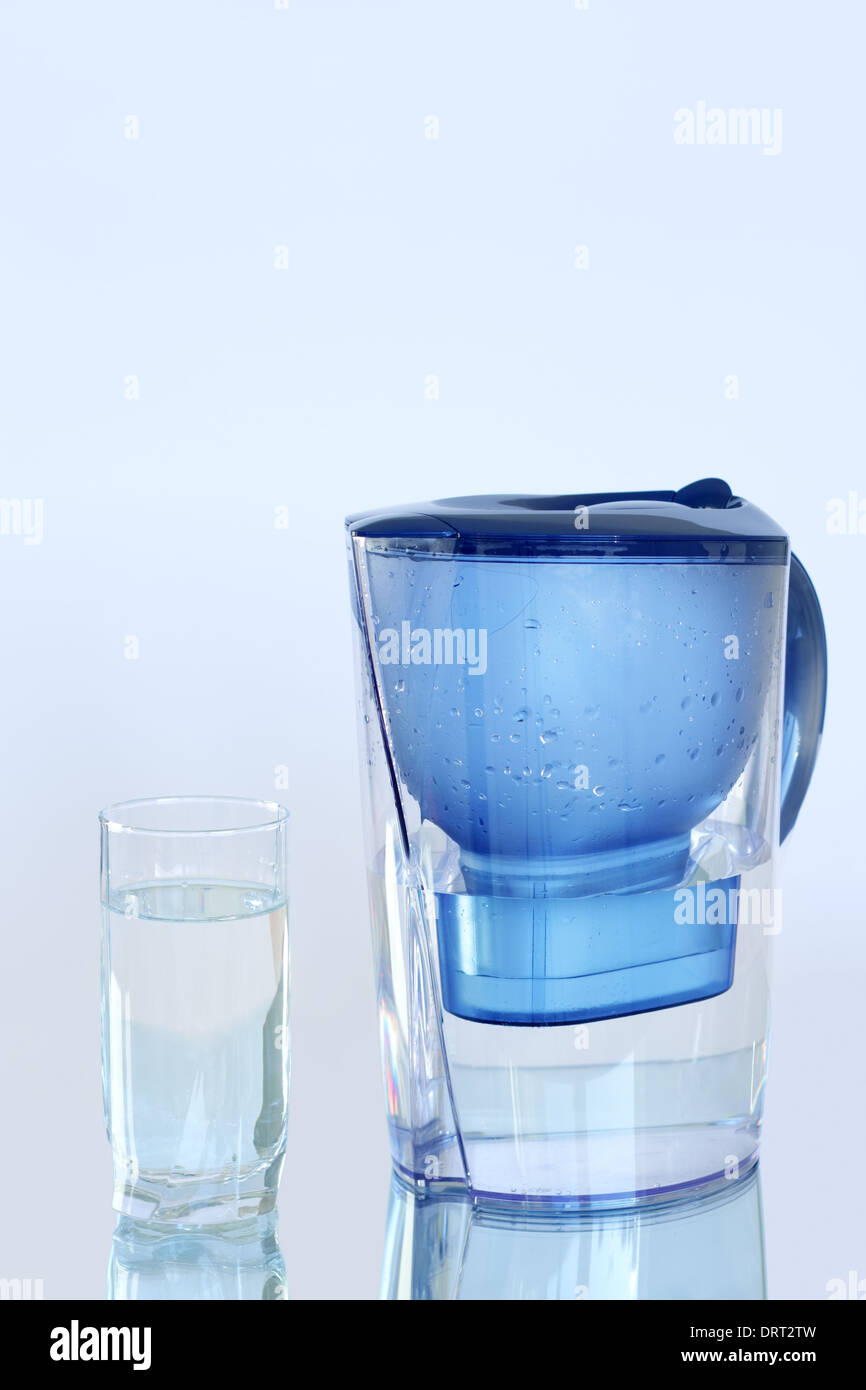 Water filter on a light blue background Stock Photo - Alamy