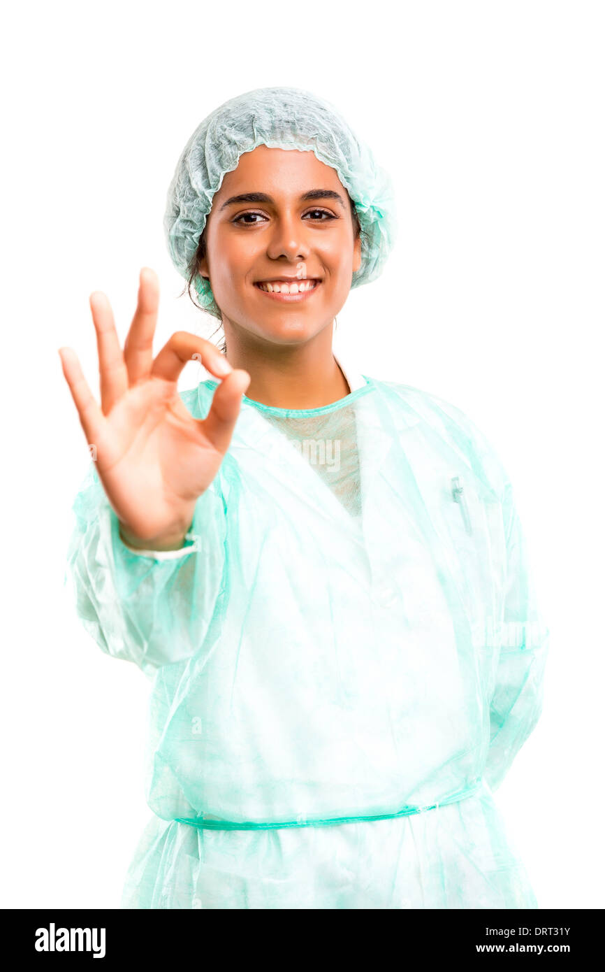 Young doctor signaling ok, isolated over a white background Stock Photo ...