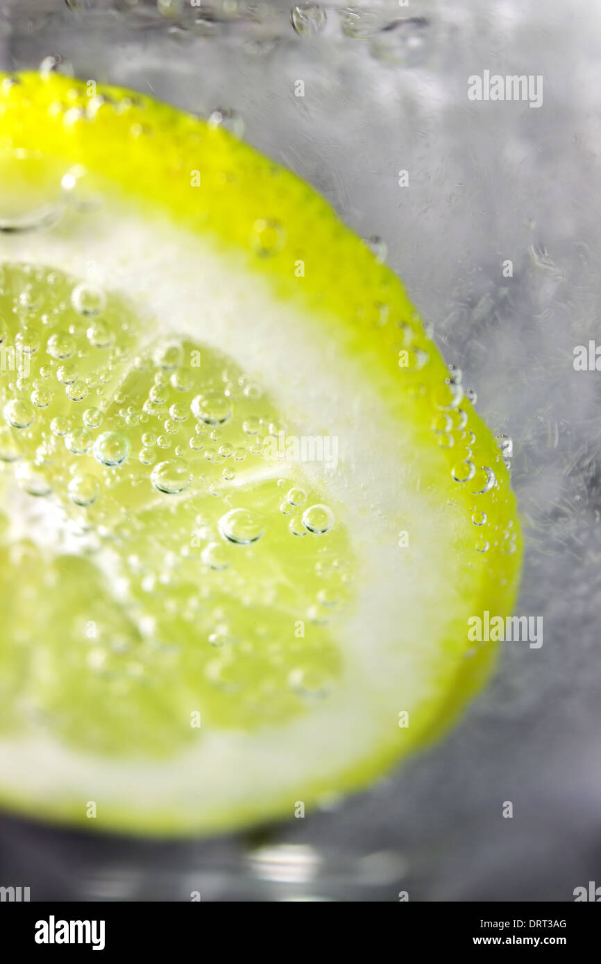 Yellow lemon in cold water Stock Photo - Alamy