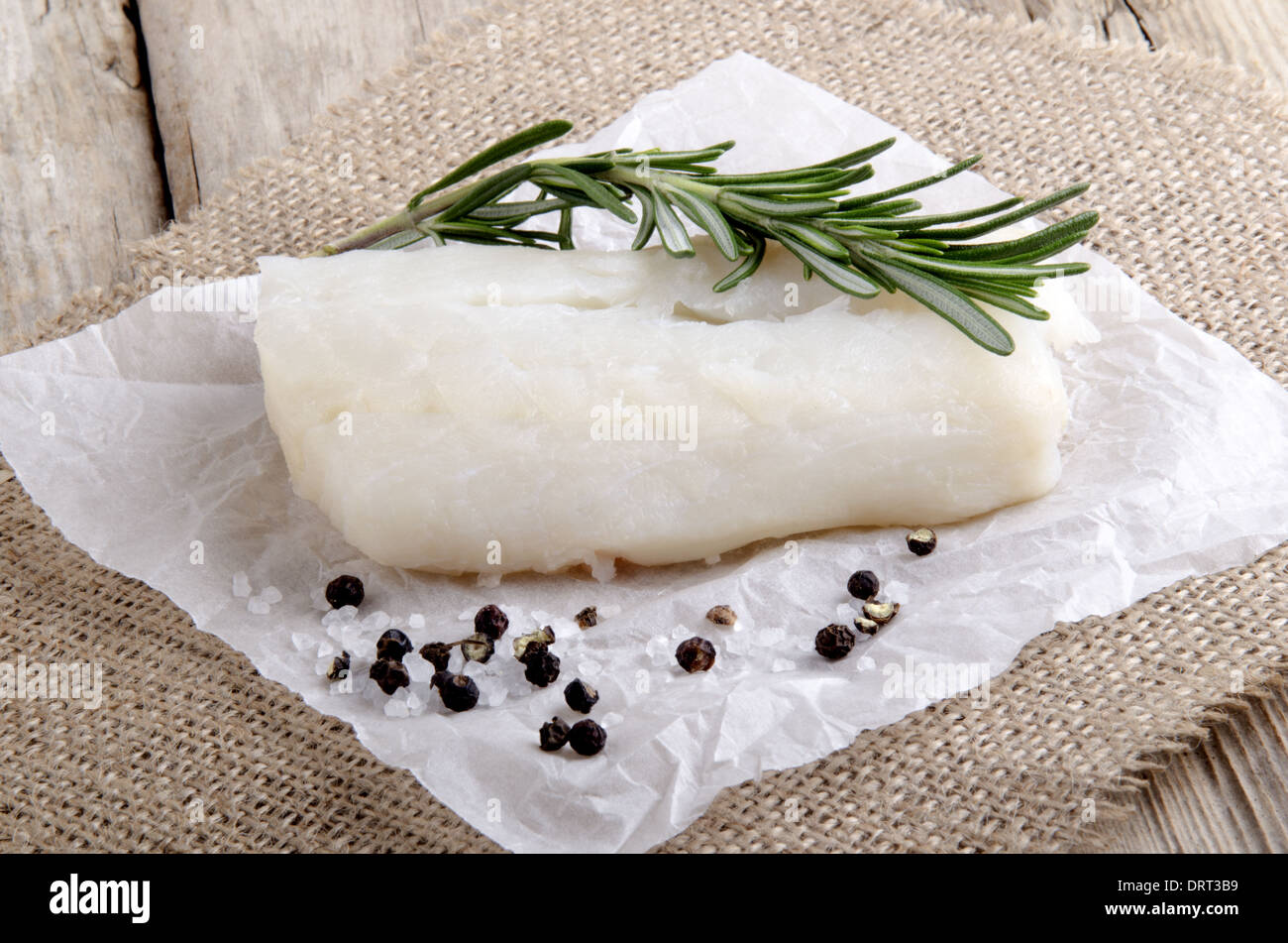 fresh cod with pepper, coarse salt and rosemary Stock Photo - Alamy