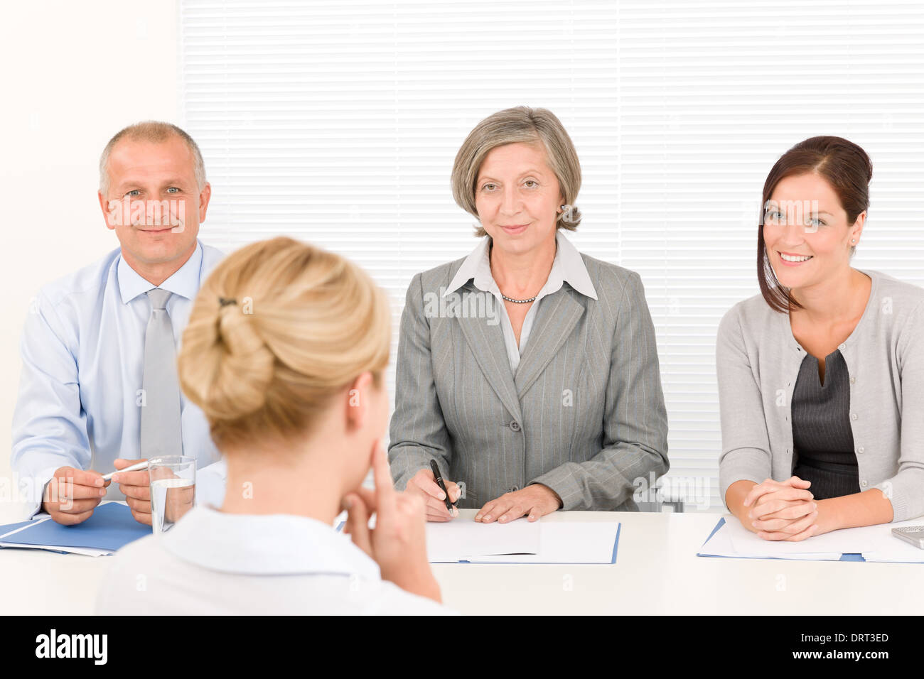Job interview young woman with business team Stock Photo - Alamy Job interview young woman with business team Stock Photo - Alamy