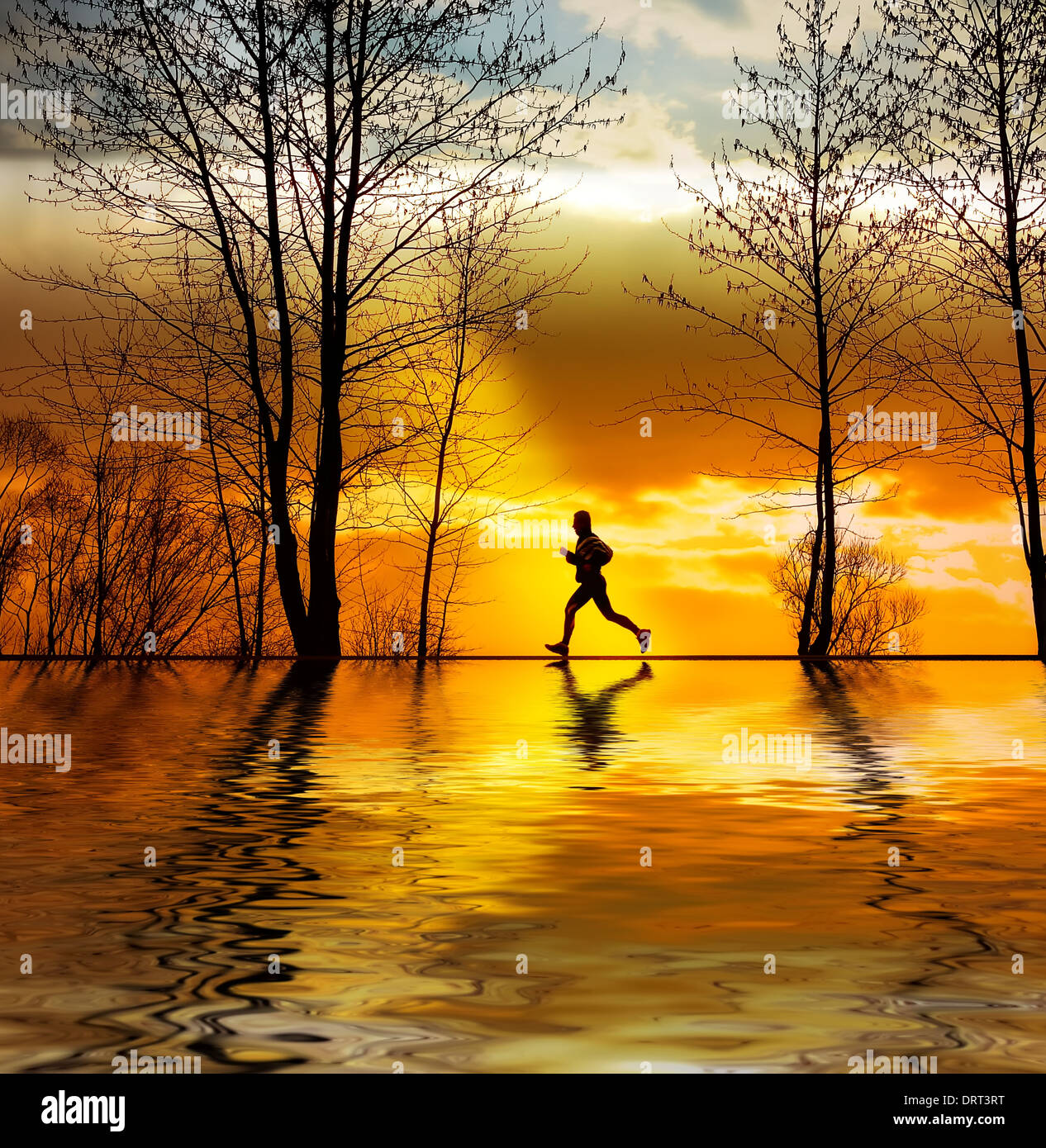 Silhouette of man running at sunset Stock Photo - Alamy