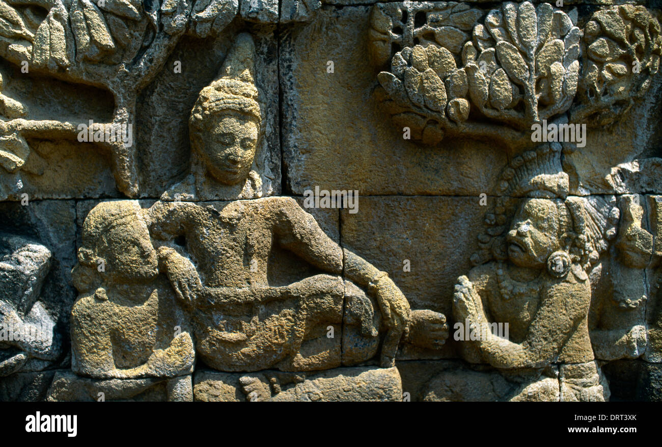 relief of buddha under bhodi tree borobodur indonesia Stock Photo - Alamy