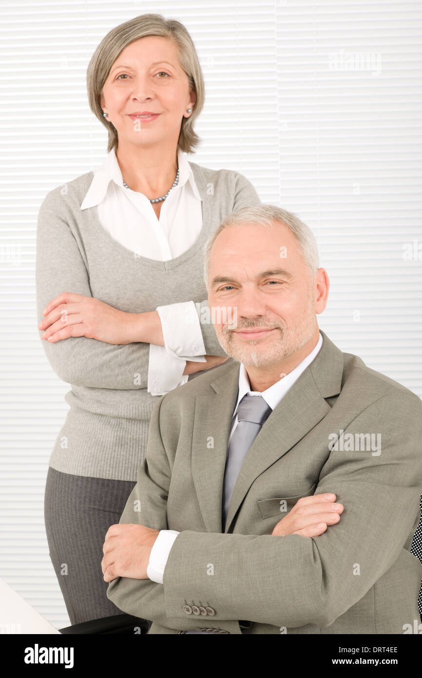 Senior businesspeople professional cross arms Stock Photo - Alamy