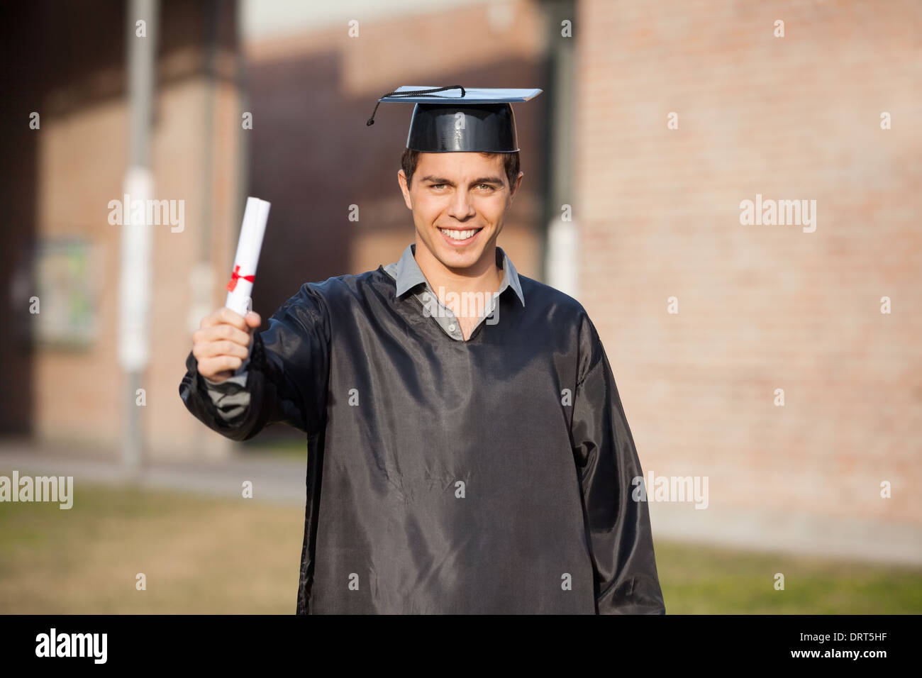 Portrait confident student graduation certificate hi-res stock ...