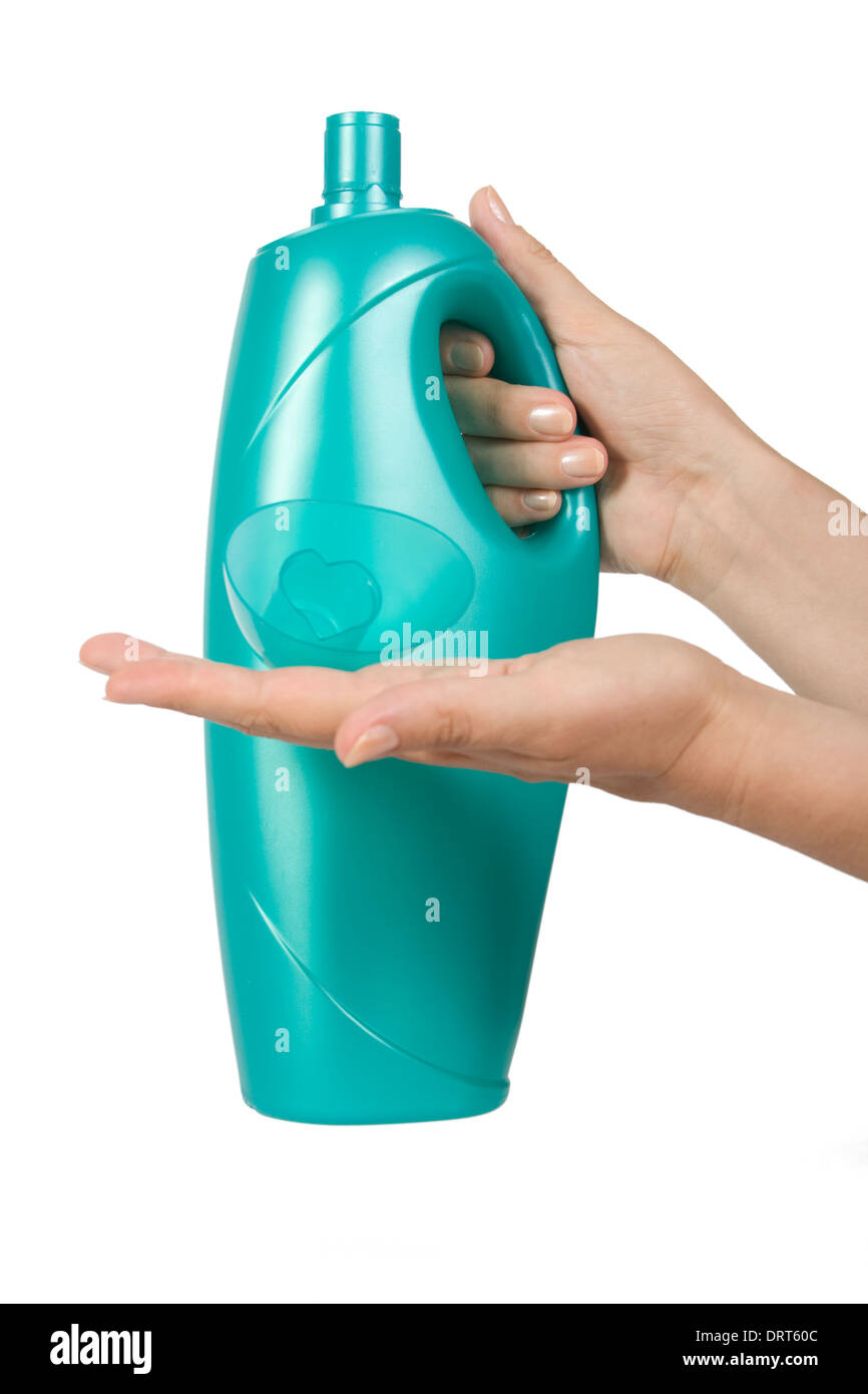 Green plastic bottle in hand Stock Photo - Alamy