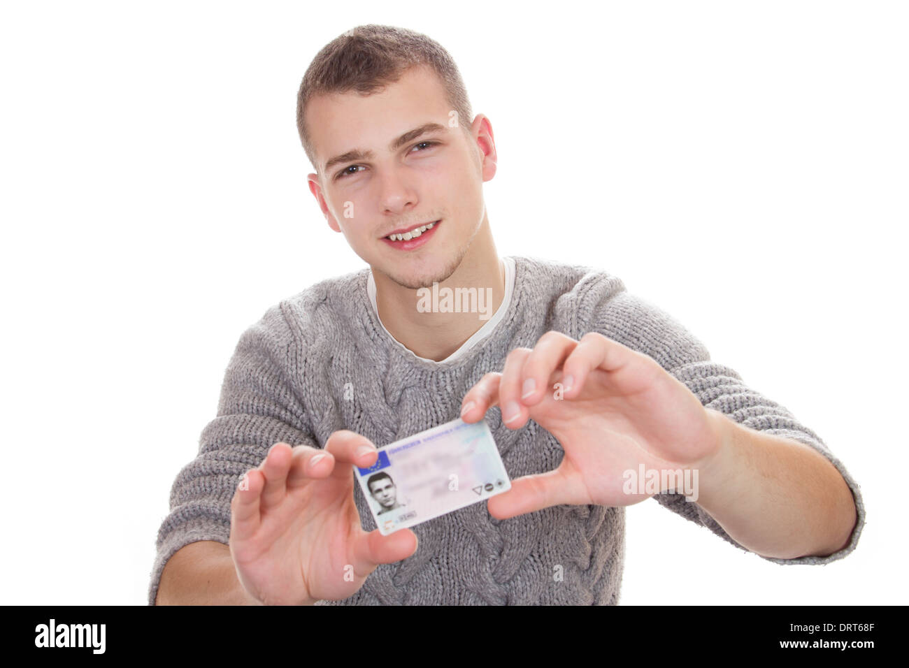 16 to 18 year old boy just received his driver license Stock Photo - Alamy