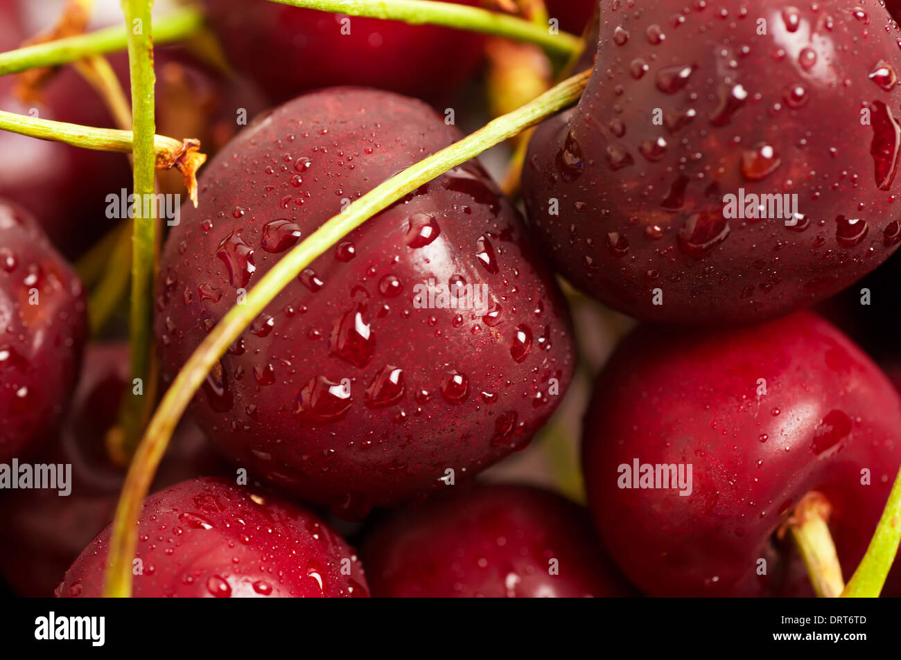 Sweet cherry background Stock Photo - Alamy