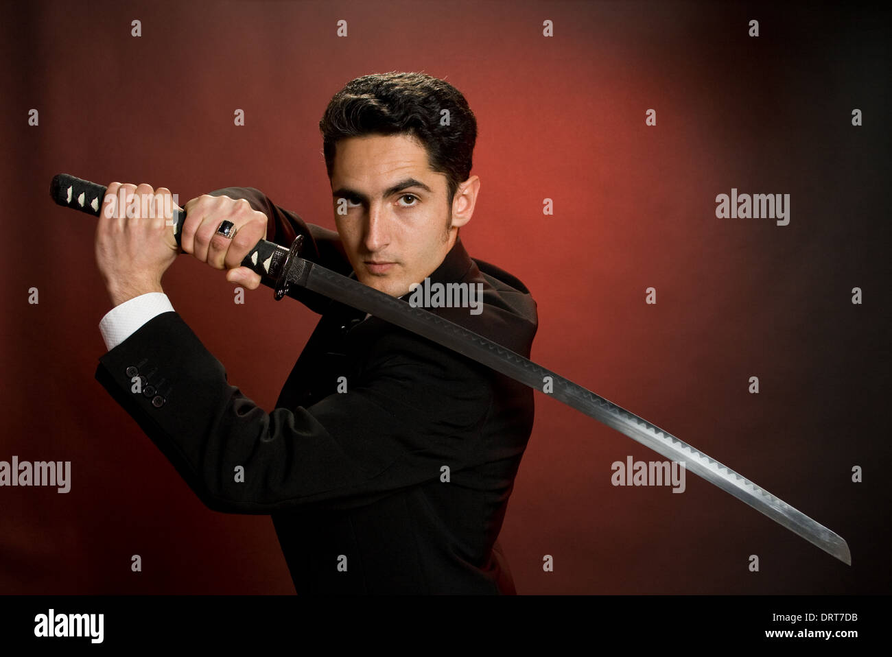 Handsome man sword hi-res stock photography and images - Alamy