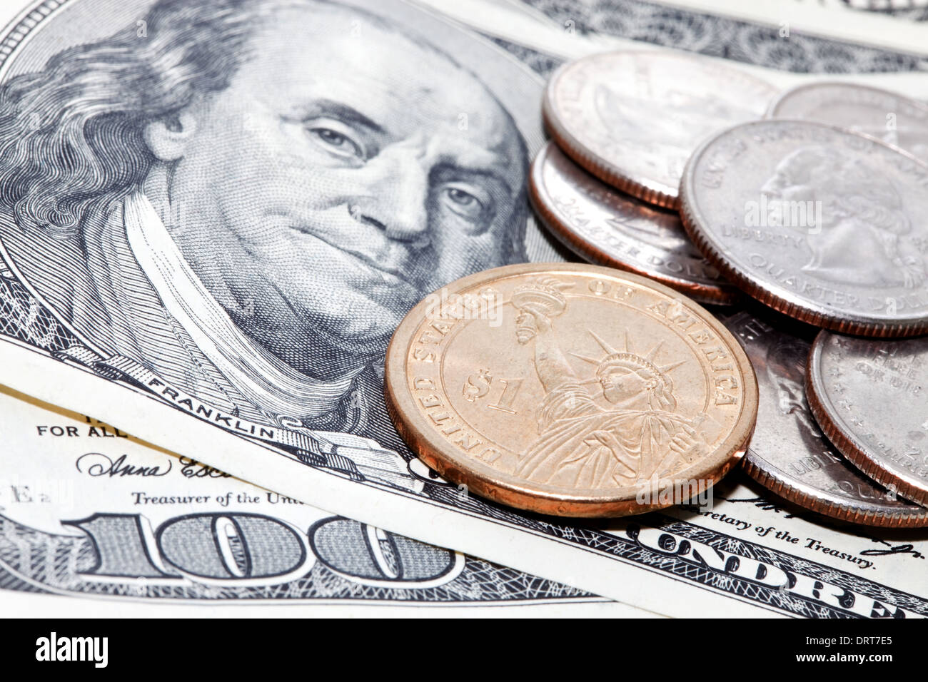 coins on dollars background Stock Photo - Alamy