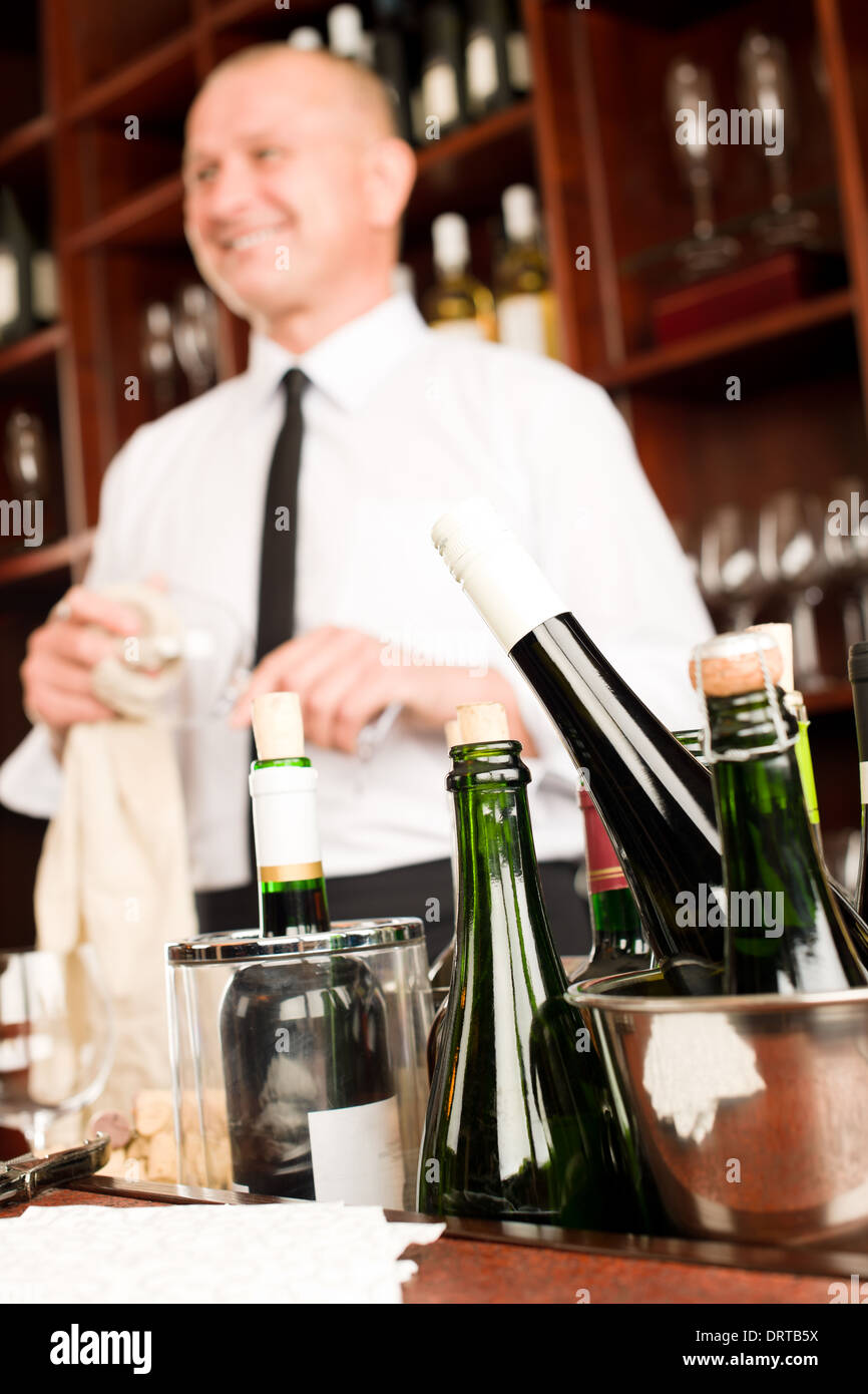 Wine bar bottles waiter in restaurant Stock Photo - Alamy
