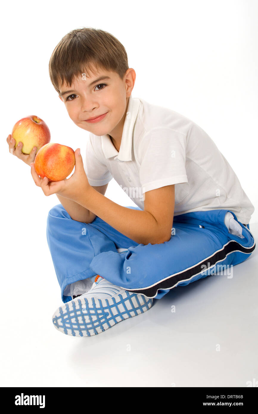 Boy with apples Stock Photo - Alamy
