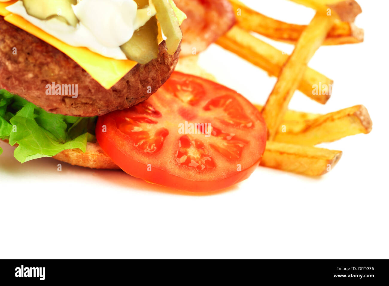 Exploded view of hamburger with french fries isolated on white ...