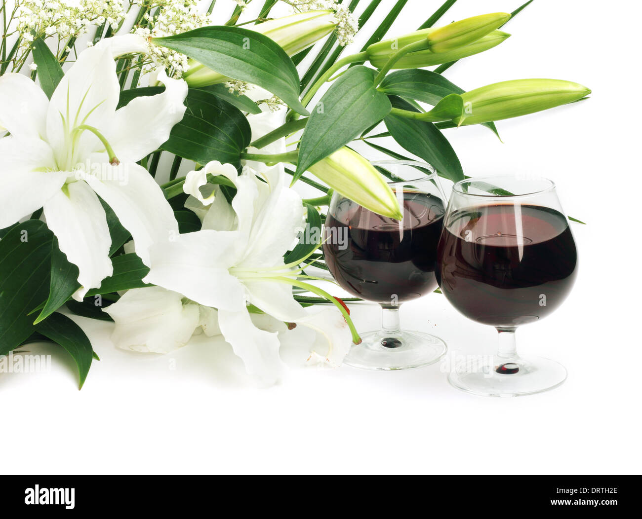 Wine and flowers on white background Stock Photo - Alamy