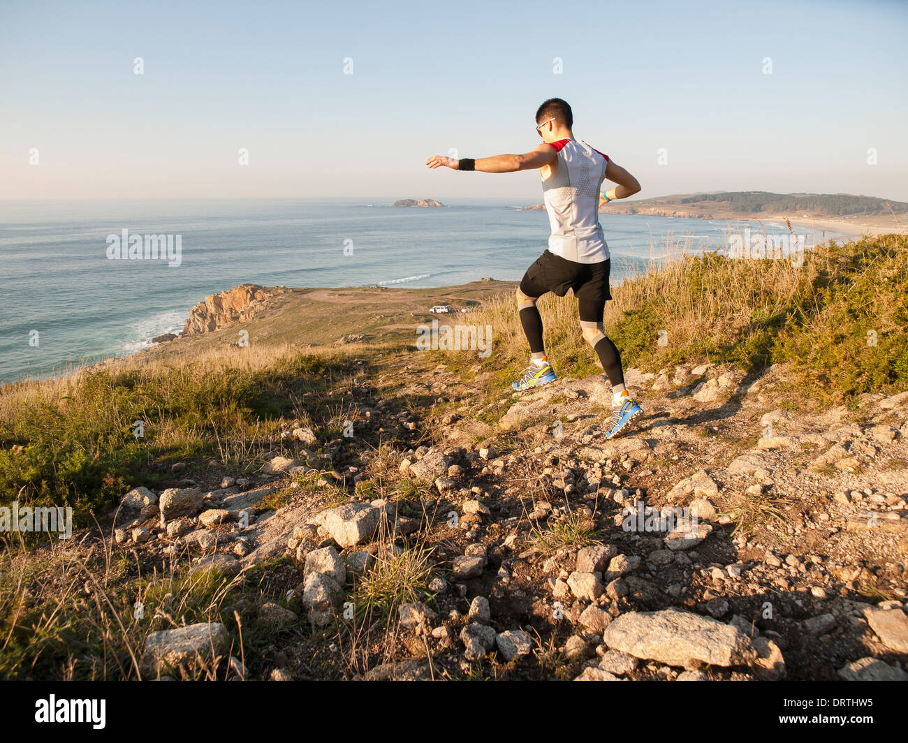 Trail Runner In Coastal Landscape High Resolution Stock Photography and ...