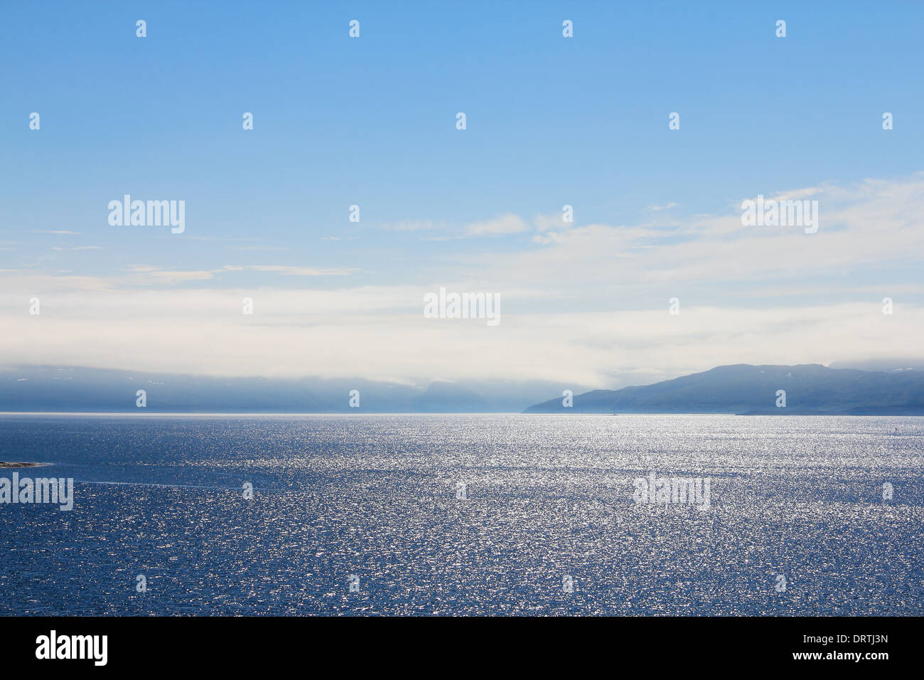 Summer panoramic view of the sea and mountain range in northern Norway ...