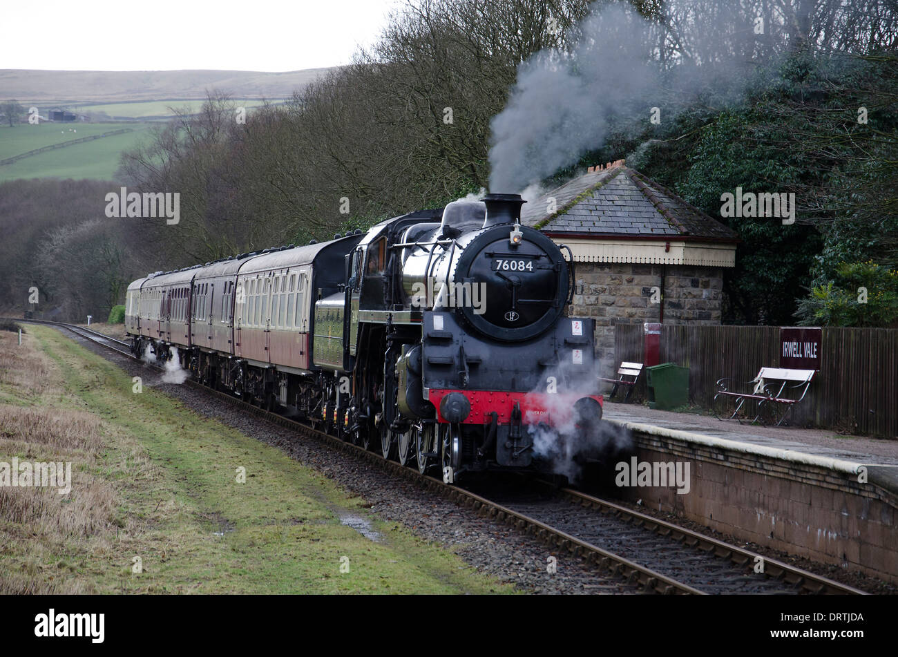 Steam Train departing with passenger service on heritage line Stock ...