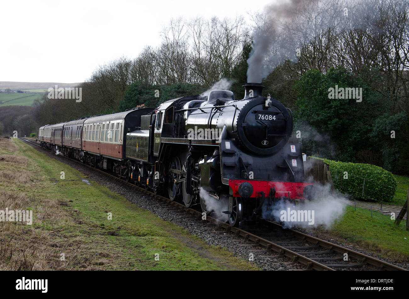 Steam Train departing with passenger service on heritage line Stock ...