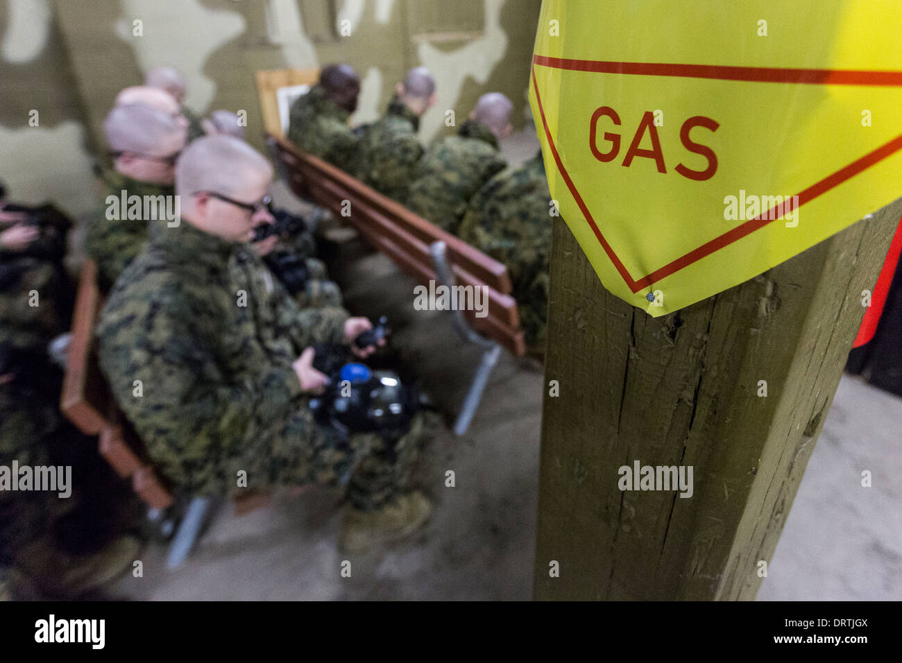 US Marine recruits are trained in proper use of their gas mask during ...