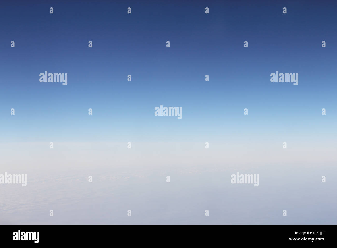 View from over a layer of thick soft clouds Stock Photo - Alamy