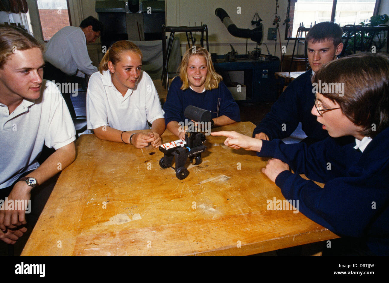 Student & Prototype Explaining To Other Students Stock Photo - Alamy