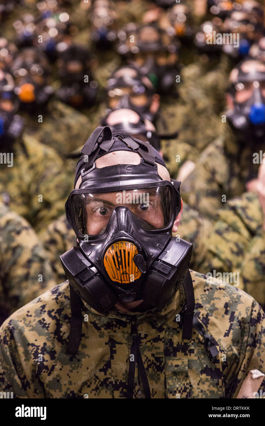 US Marine recruits are trained in proper use of their gas mask during ...