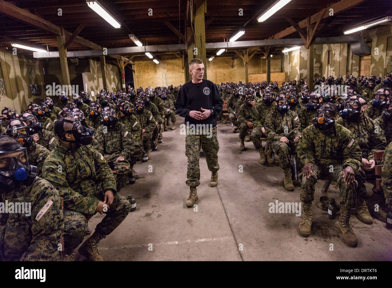 US Marine recruits are trained in proper use of their gas mask during ...