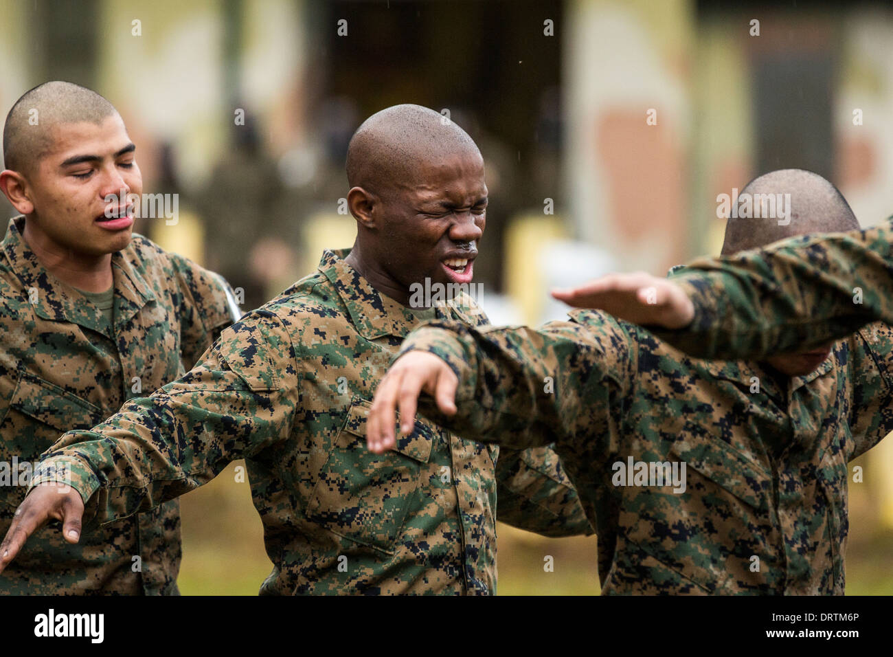 US Marine recruits choke and gasp for air after exiting the gas chamber ...