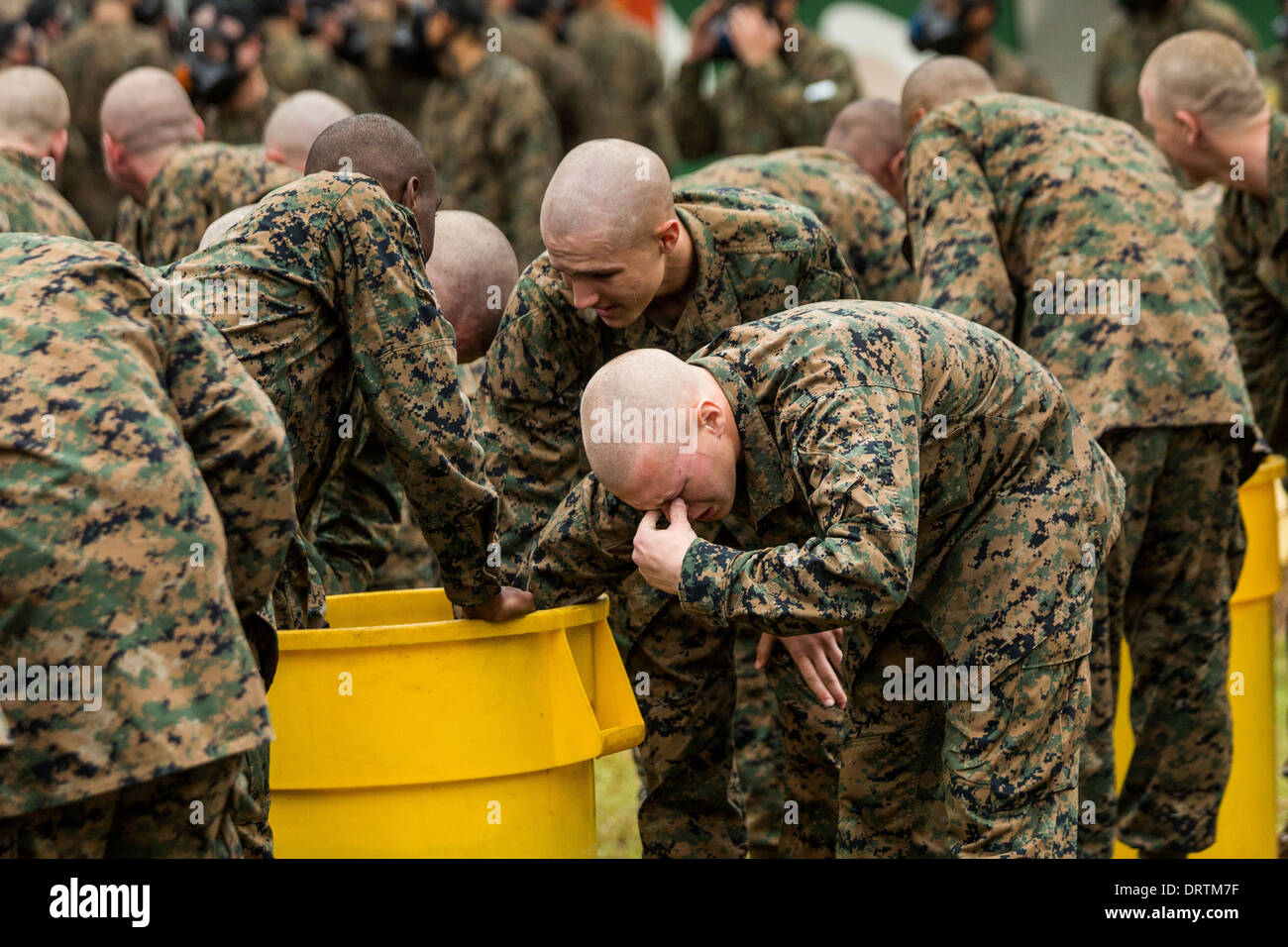 US Marine recruits choke and gasp for air after exiting the gas chamber ...