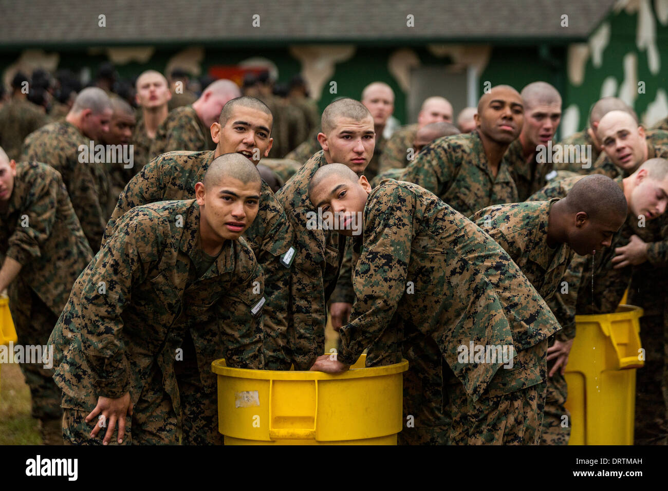US Marine recruits choke and gasp for air after exiting the gas chamber ...