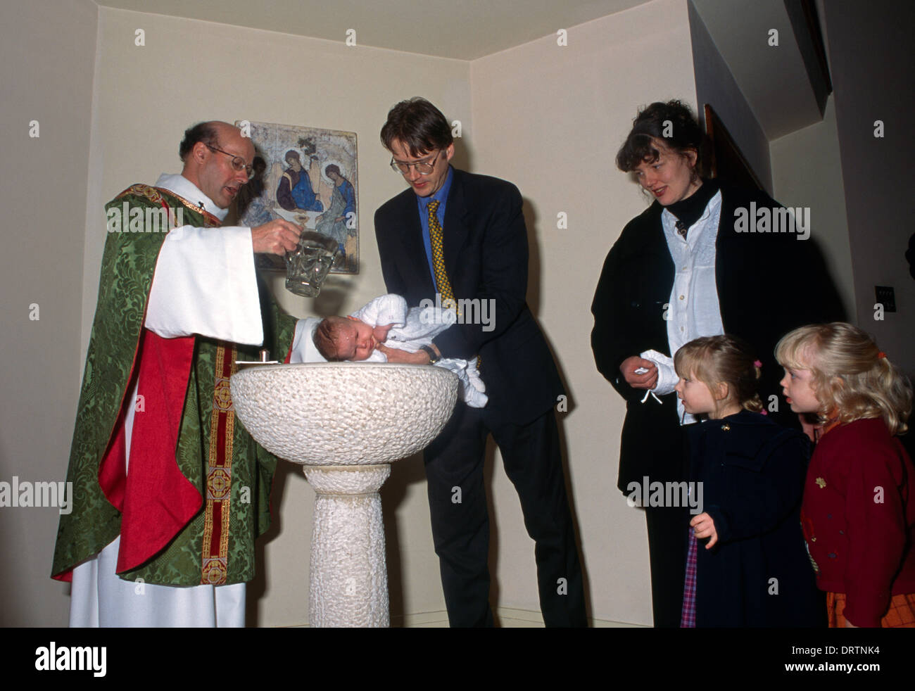 Child baptism holy water hi-res stock photography and images - Alamy