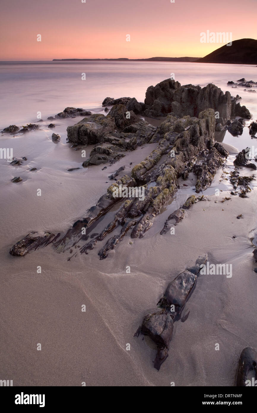 Jagged Rocks On Beach High Resolution Stock Photography and Images - Alamy