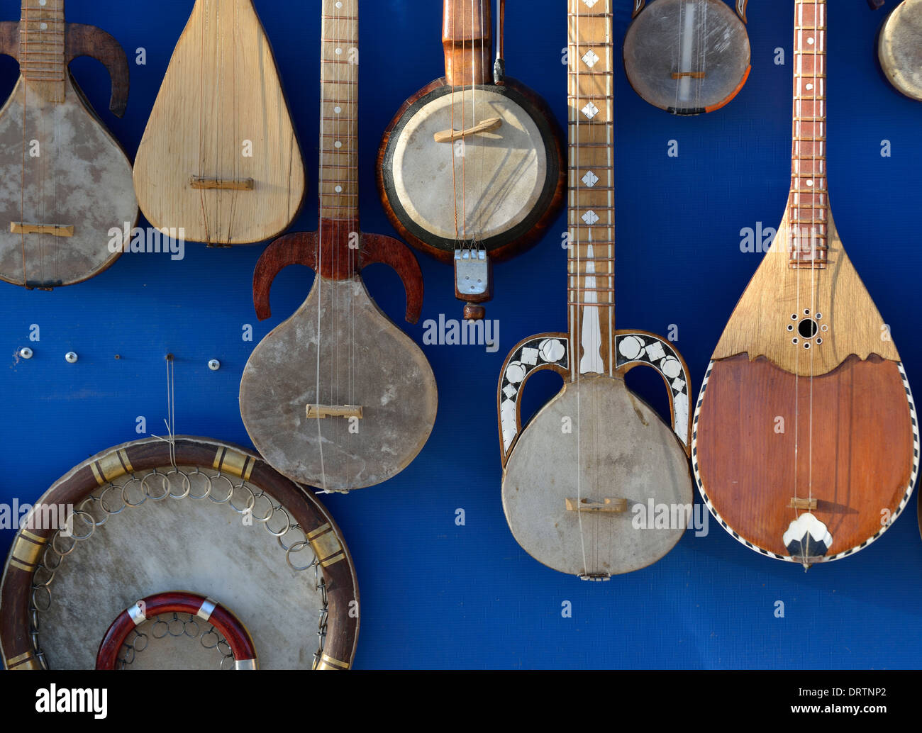 Traditional instruments in a bazaar stall, Bukhara, Uzbekistan Stock ...